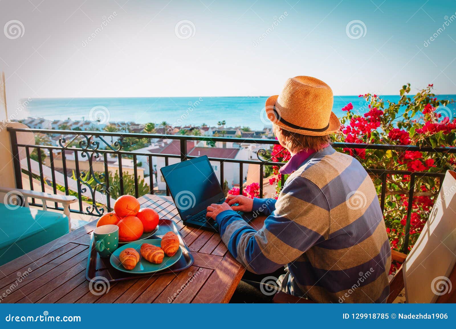 Remote Work Concept- Young Man with Laptop on Scenic Terrace Stock ...