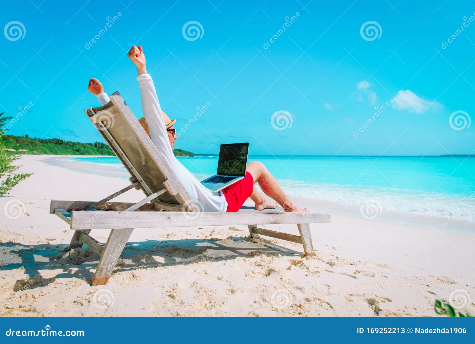 Young Man Working on Laptop at Beach Stock Image - Image of happy ...