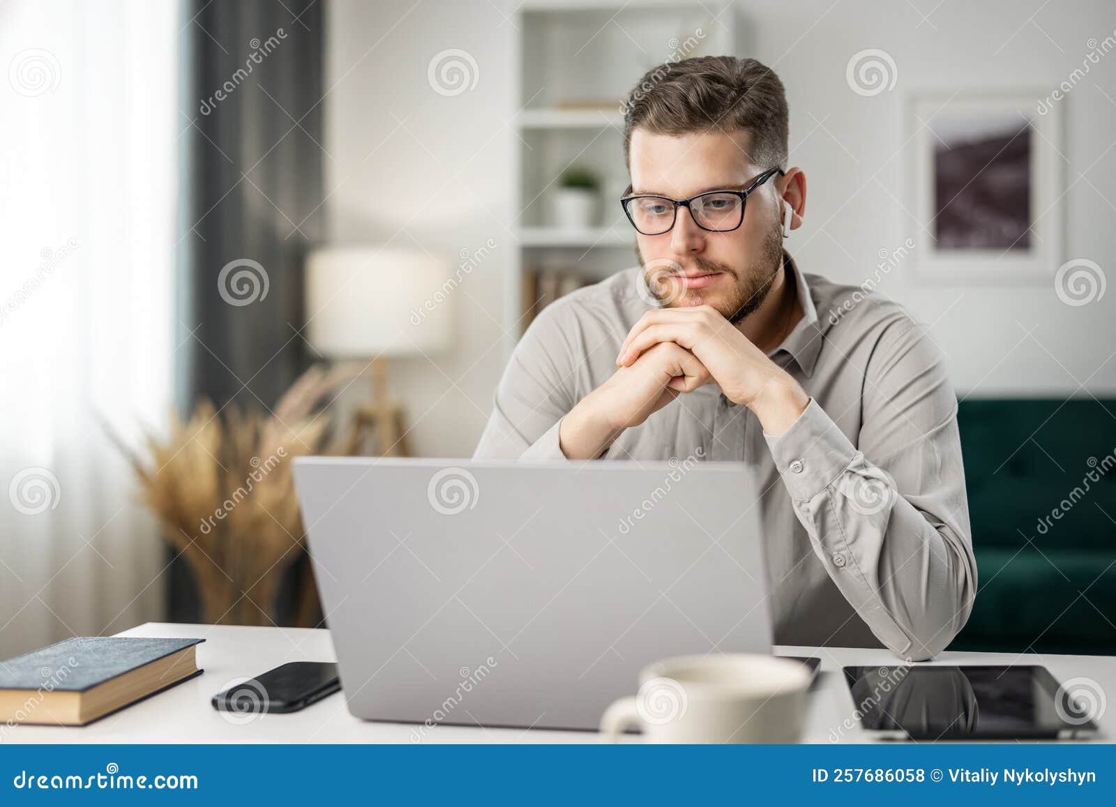 Remote work from home stock photo. Image of modern, male - 257686058