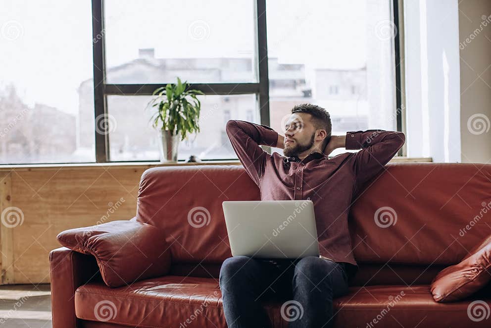 Remote Work. Young Man Working at Computer at Home Stock Photo - Image ...