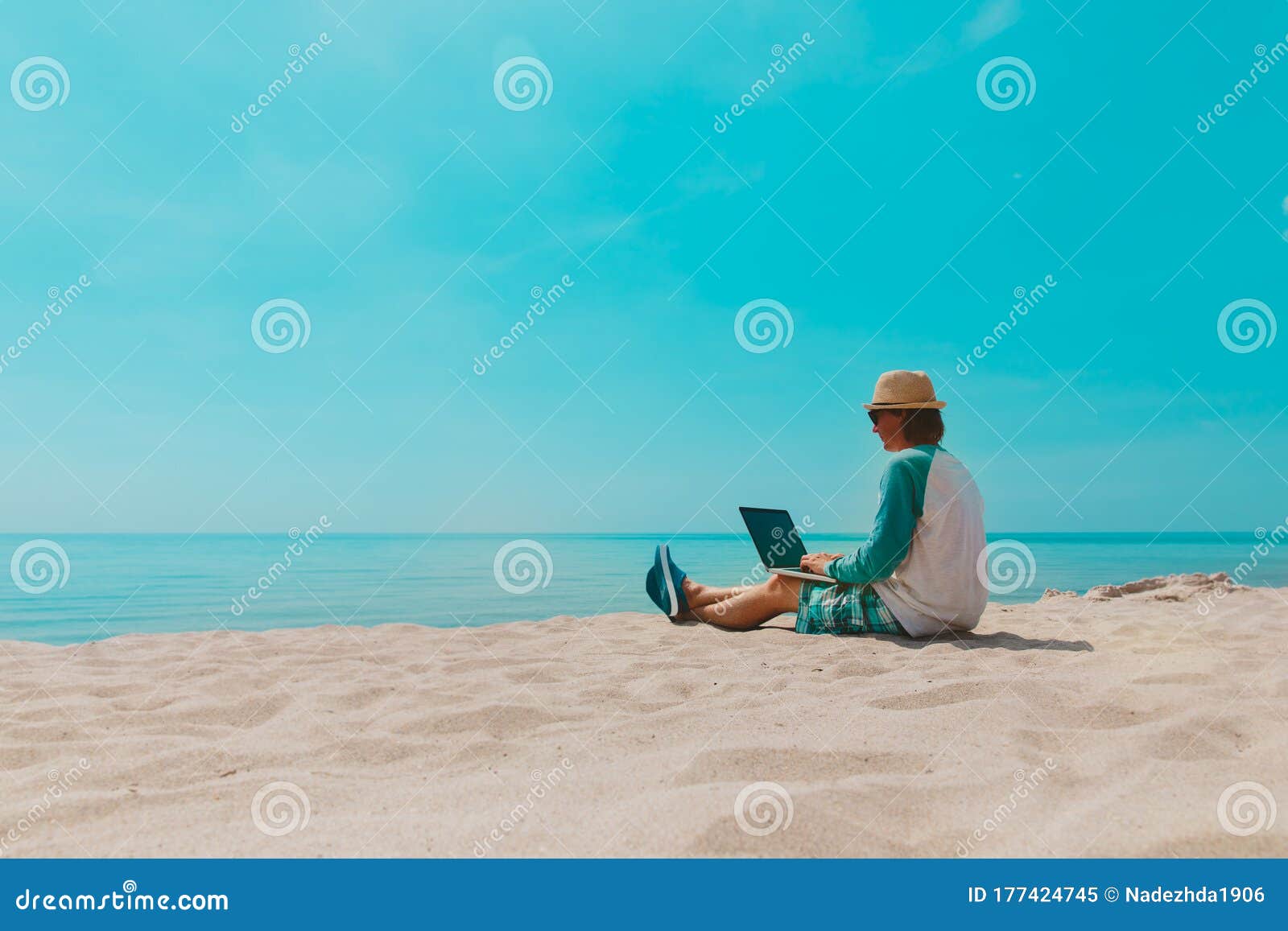 Remote Work - Young Man Working with Laptop on Beach Stock Image ...