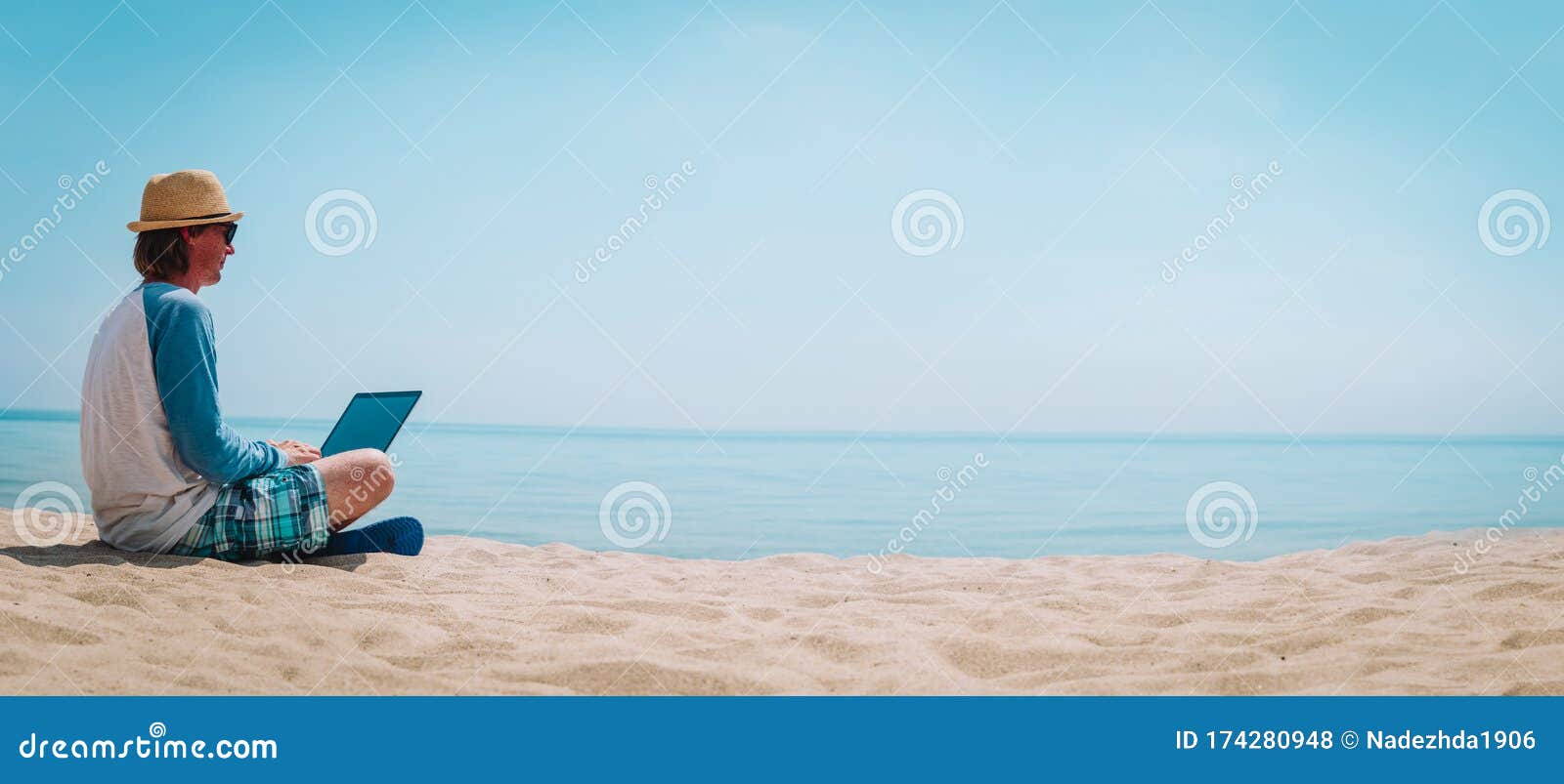 Remote Work - Young Man Working with Laptop on Beach Stock Photo ...
