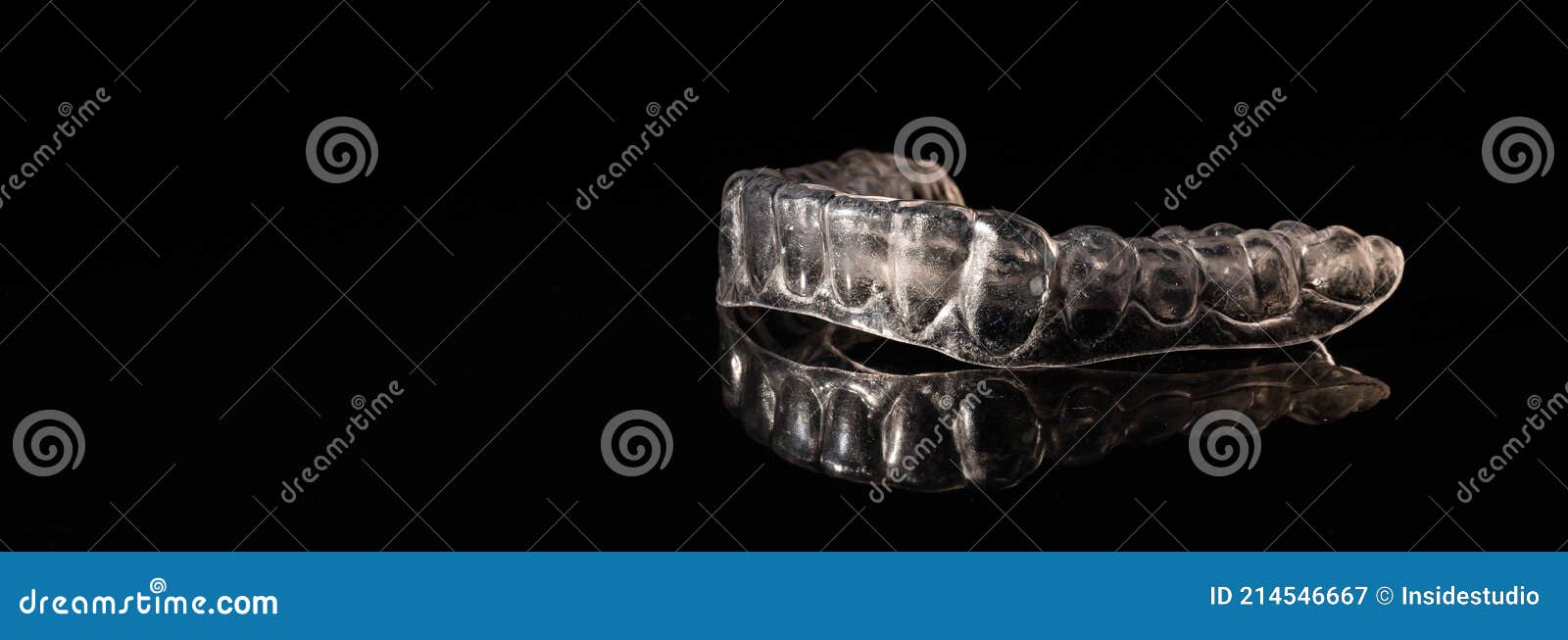 Removable Plastic Retainers for Bite Correction on a Black Background ...