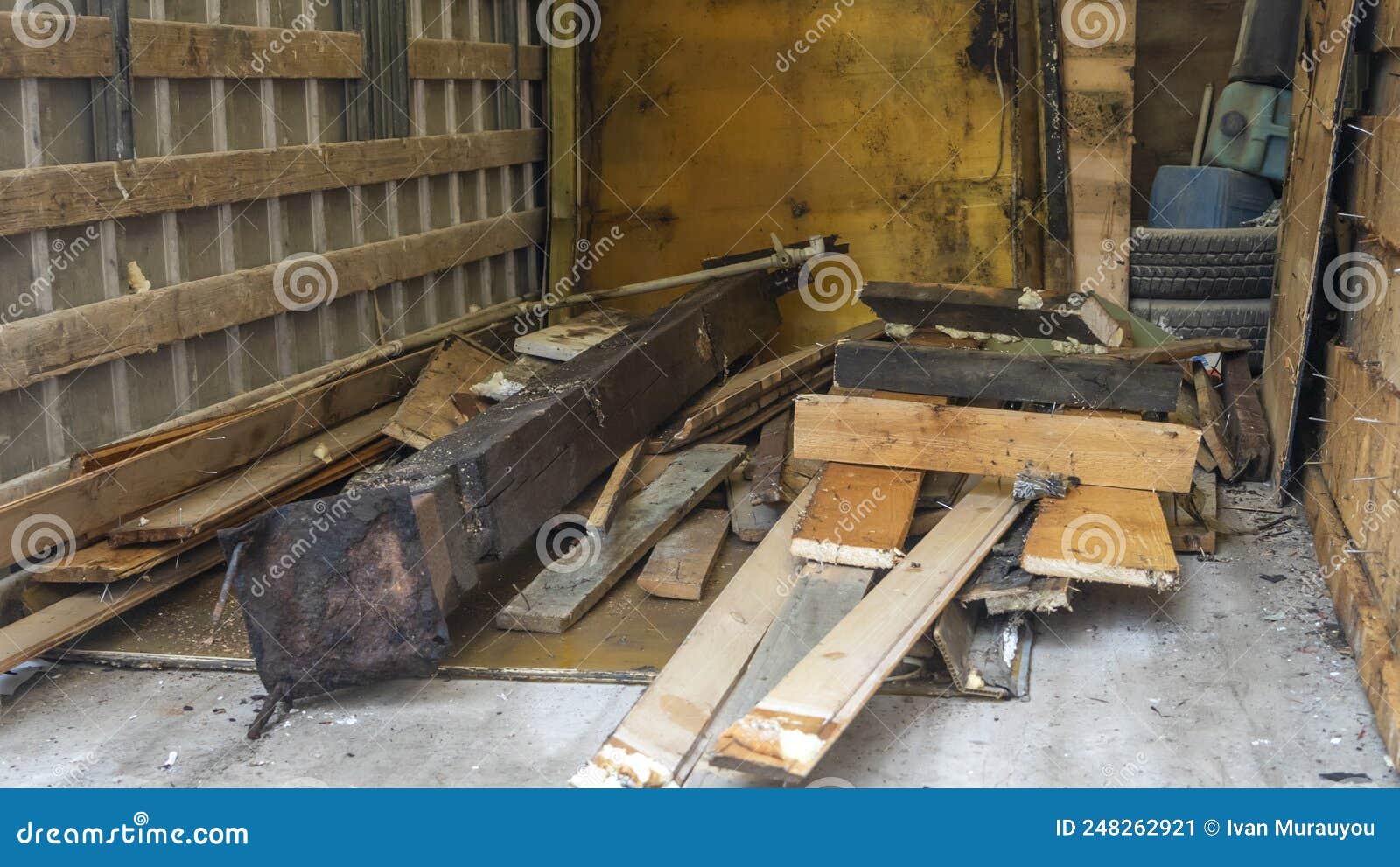 Removal of Construction Debris. Loading the Garbage Can Waste ...