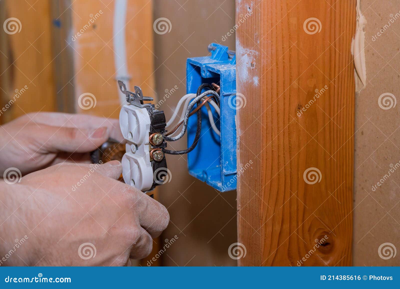 Replacing Old Broken an Electrical Outlet into the Wall Box Stock Photo ...