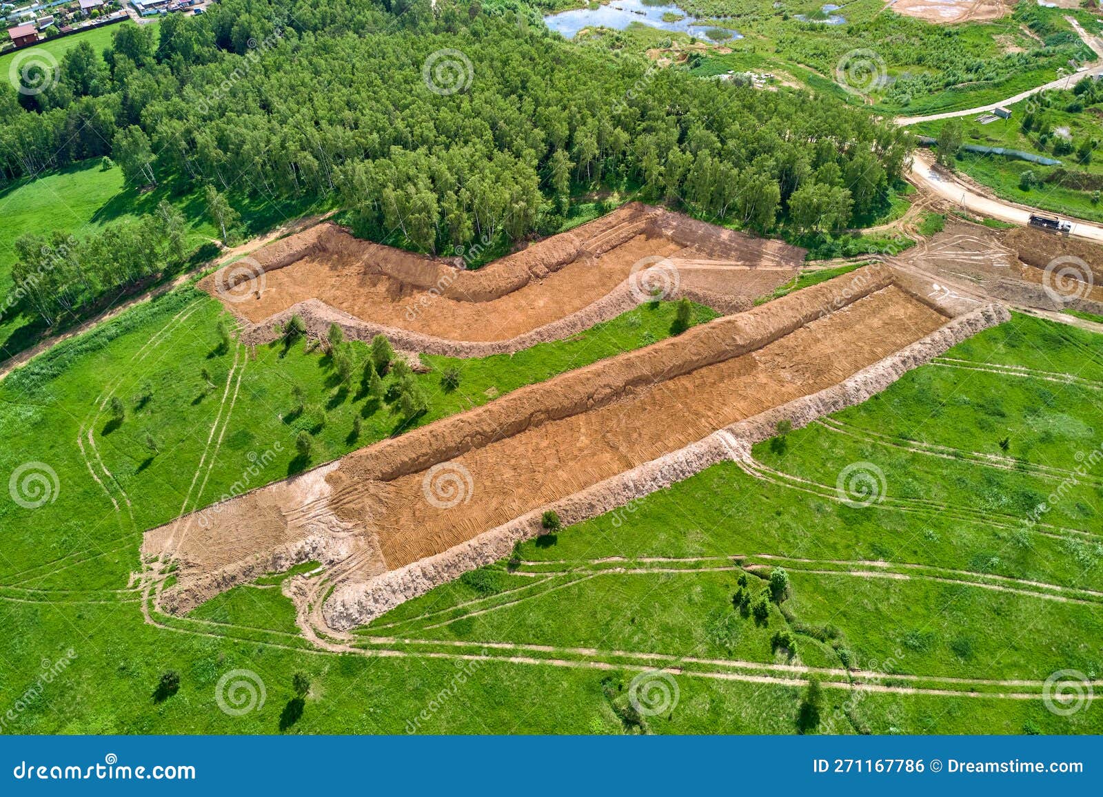 Removal of the Top Layer of Earth Overburden for the Development of a ...