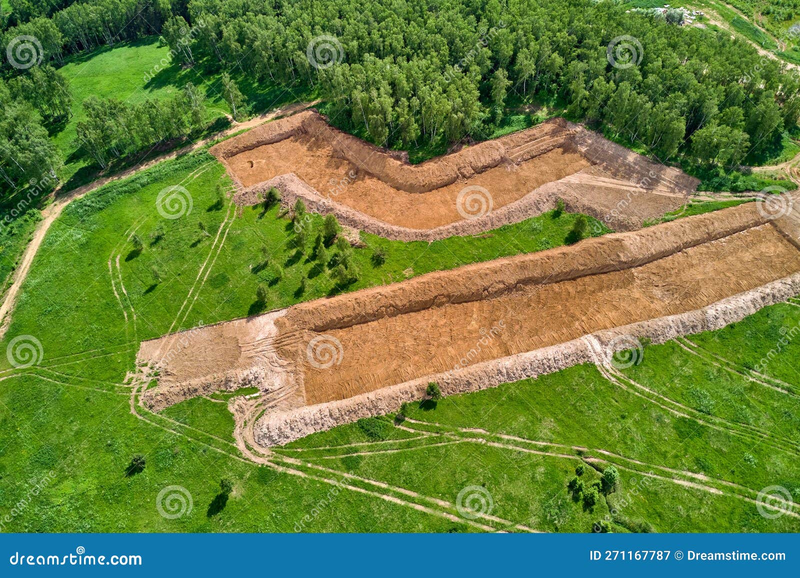 Removal of the Top Layer of Earth Overburden for the Development of a ...