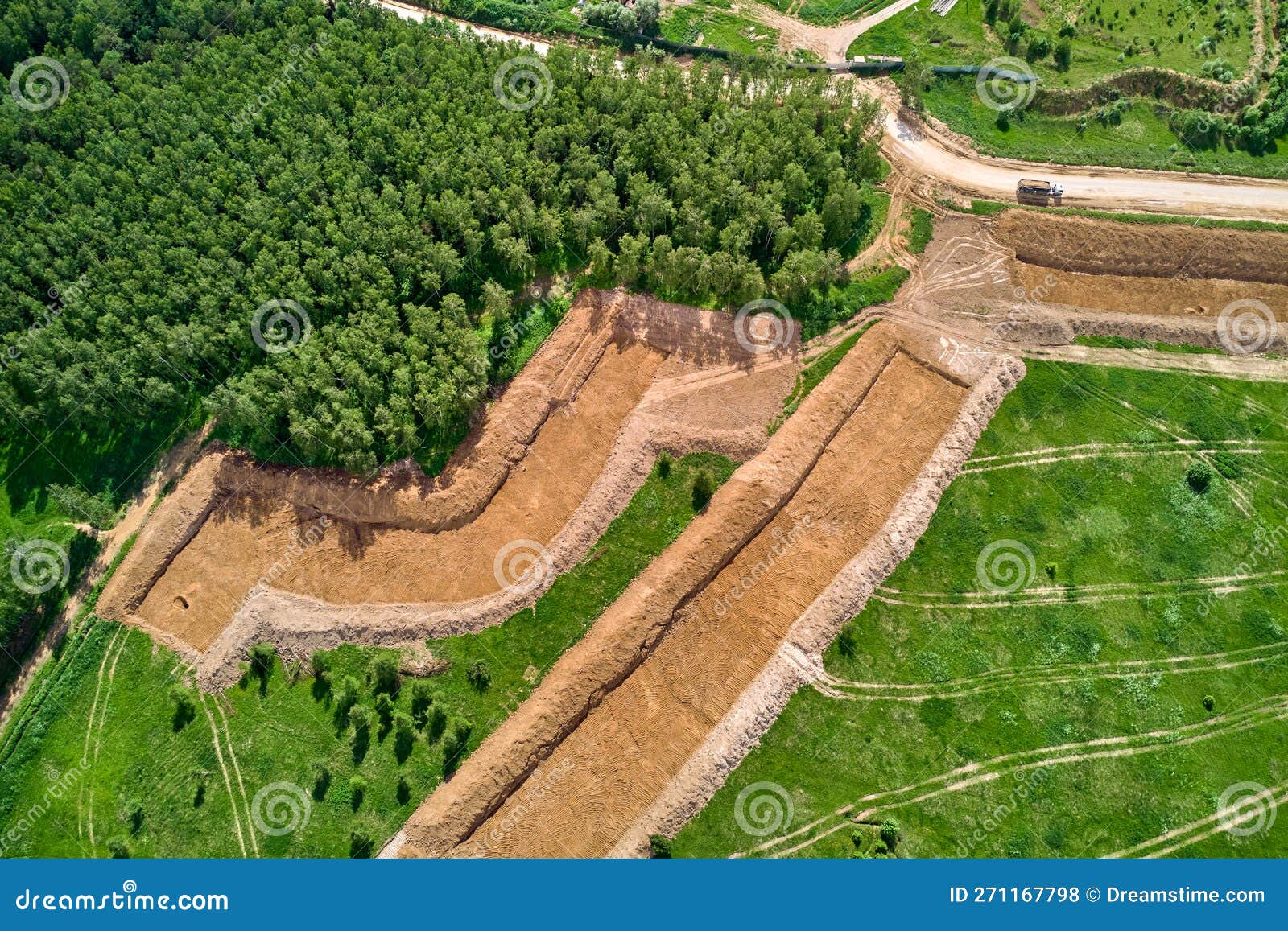 Removal of the Top Layer of Earth Overburden for the Development of a ...