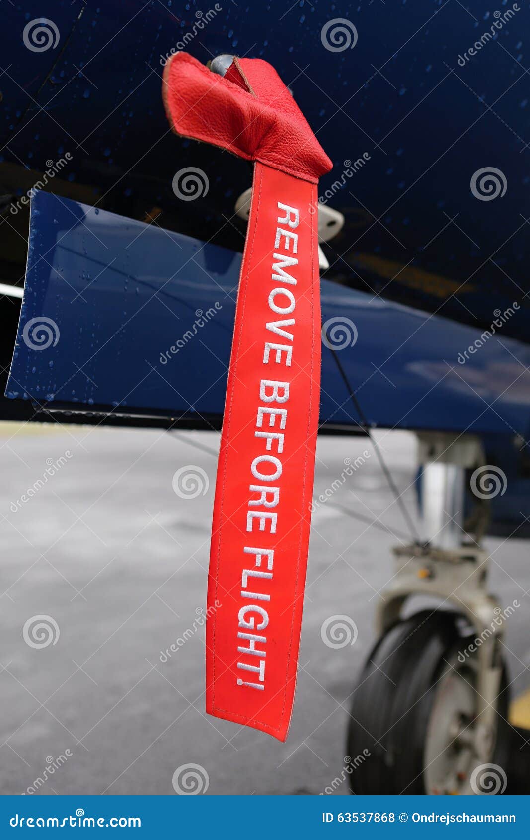 Remove Before Flight Red Ribbon Hanging Off Fighter Jet In Hangar ...