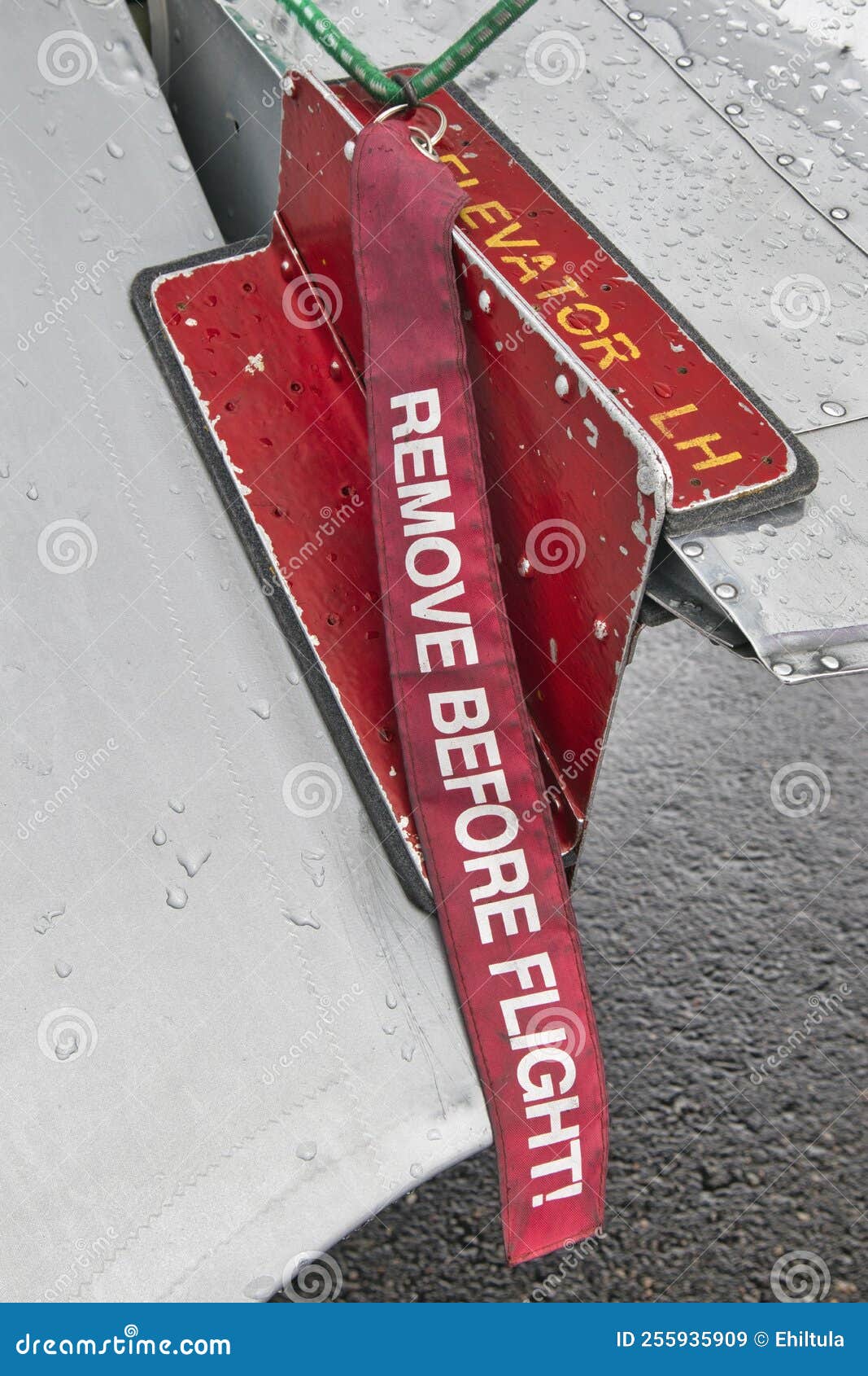 A Remove before Flight Ribbon on a Airplane Stock Image - Image of ...