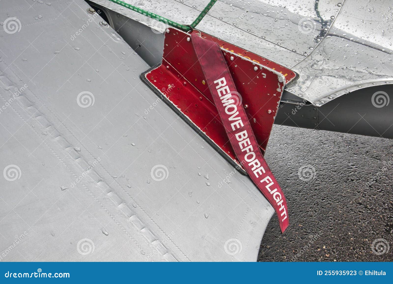 A Remove before Flight Ribbon on a Airplane Stock Image - Image of ...