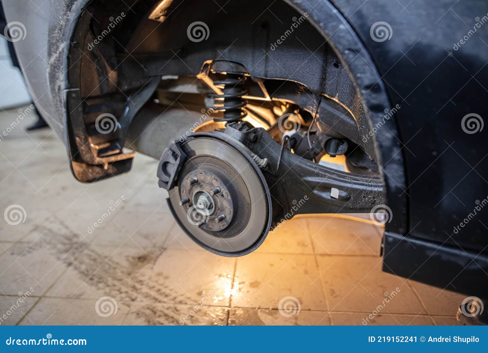 A Removed Wheel on a Car in a Technical Center. Stock Image - Image of ...