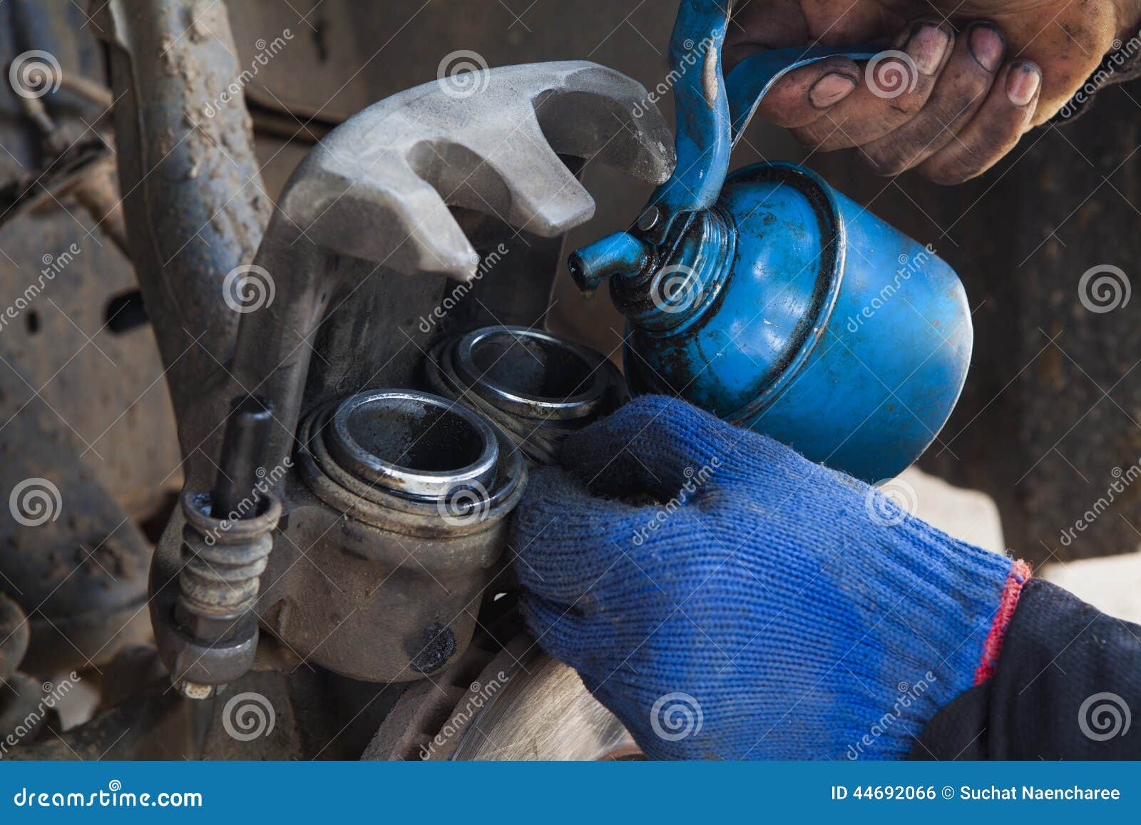 Removing Brake Caliper stock photo. Image of land, people - 44692066