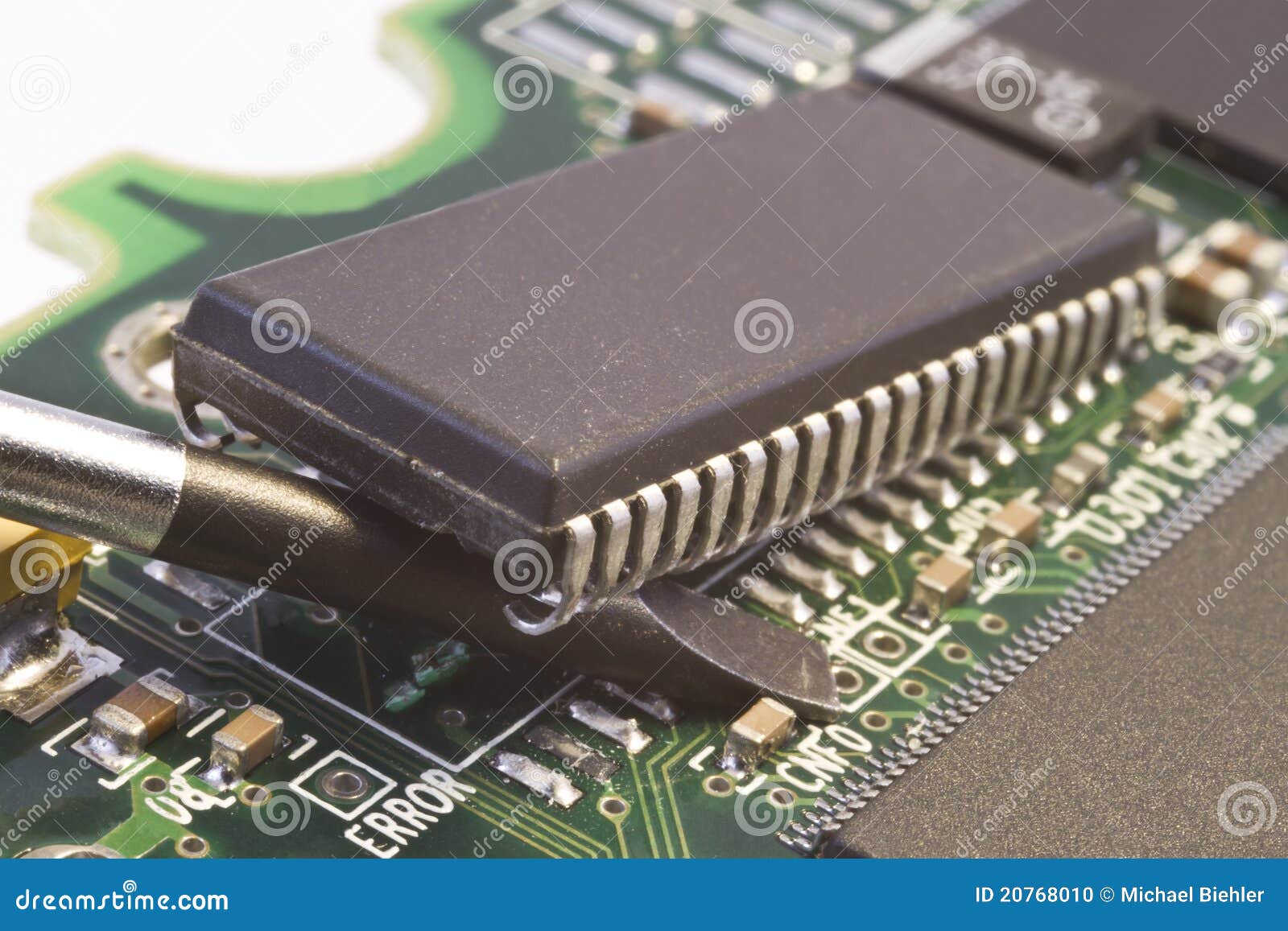 Removing computer chip stock photo. Image of group, green - 20768010