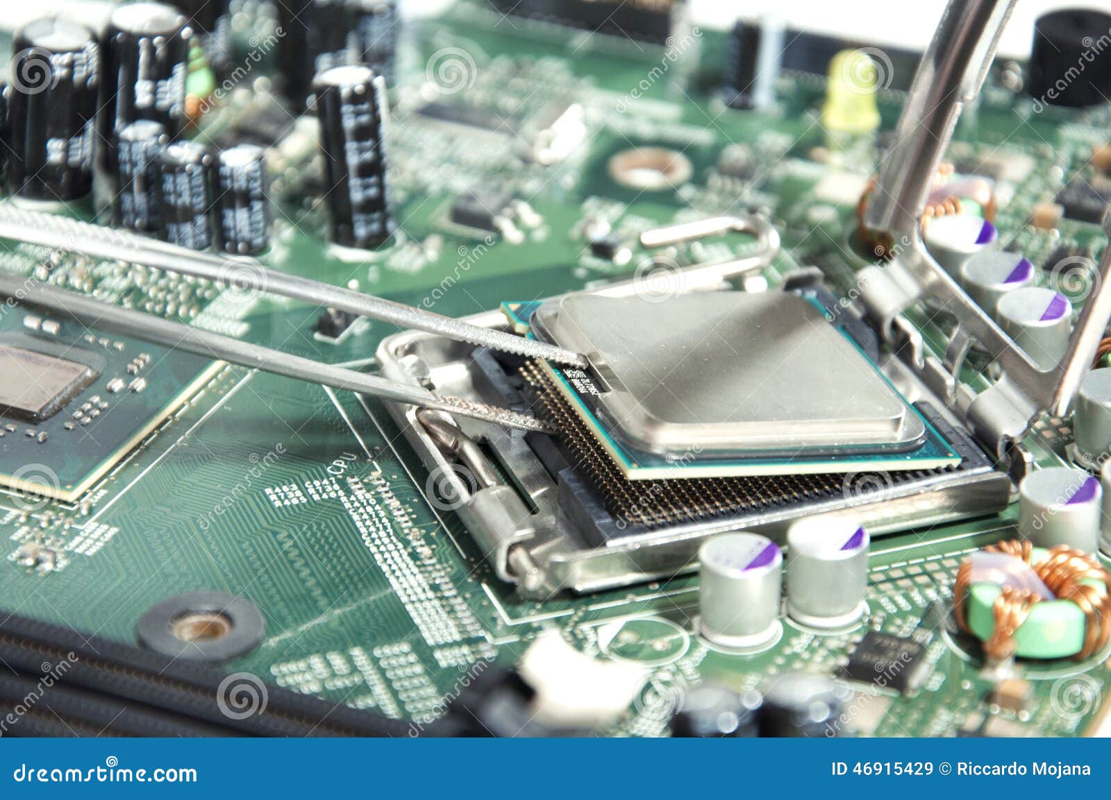 Removing CPU from Motherboard Stock Image - Image of technology, metal ...