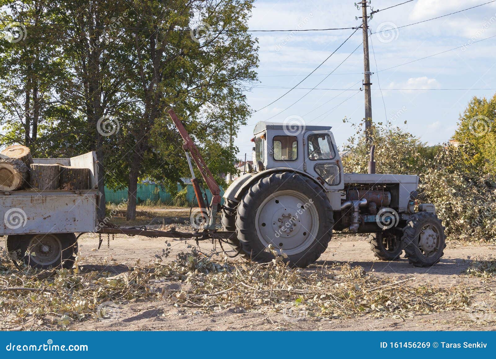 Removing Fallen Tree with Tractor and Loader Stock Image - Image of ...