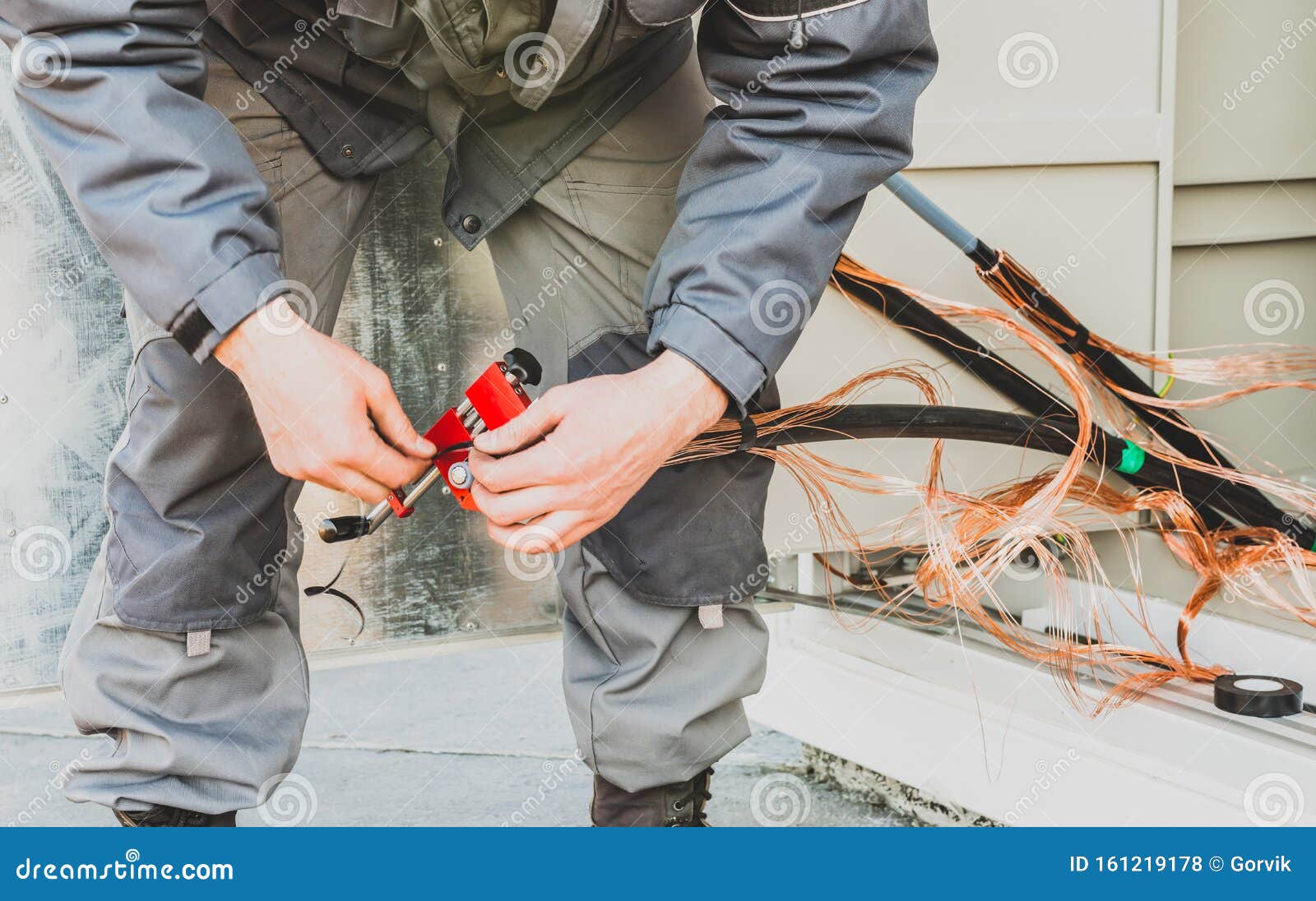 Removing the Insulating Layer from the Cable Stock Photo - Image of ...