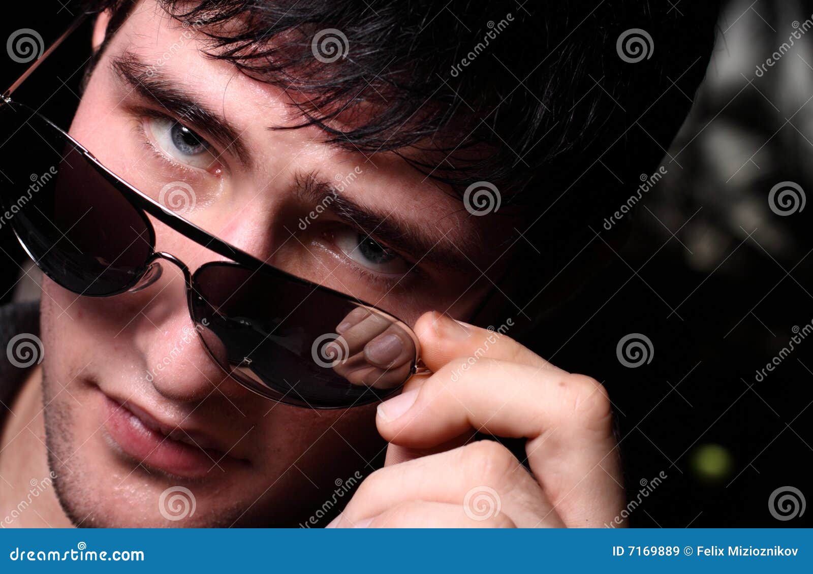 Removing shades stock image. Image of male, handsome, hand - 7169889