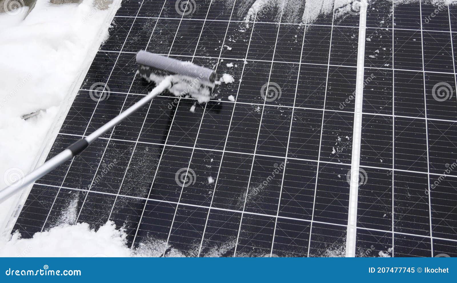 Removing Snow from the Solar Panel. the Solar Element Under the Snow.3 ...