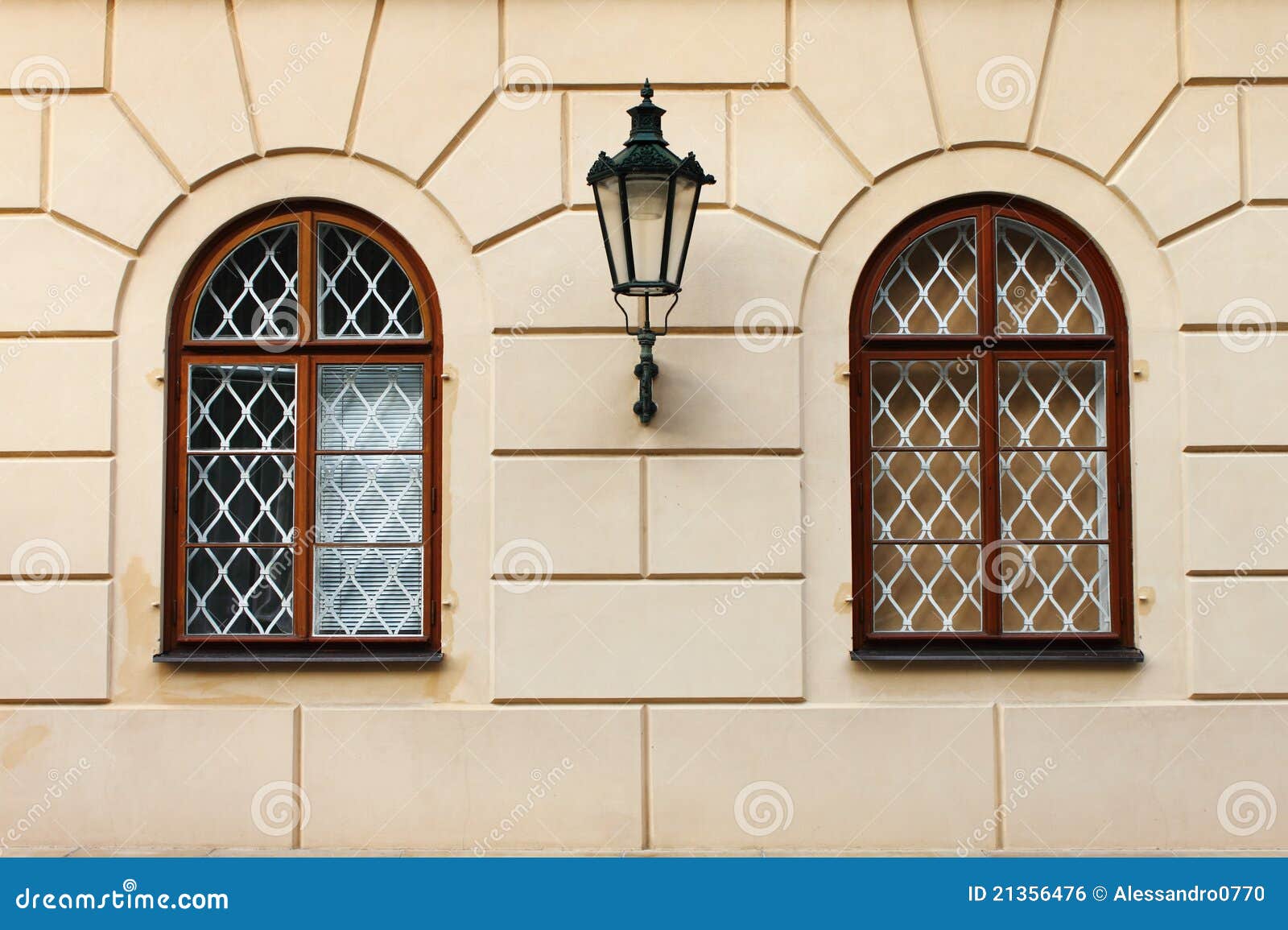 Renaissance Windows with Iron Street Lamp Stock Photo - Image of shaped ...