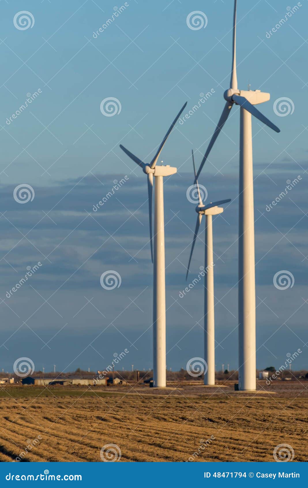 Renewable Energy - Wind Turbines in Rural Hay Fields Stock Photo ...