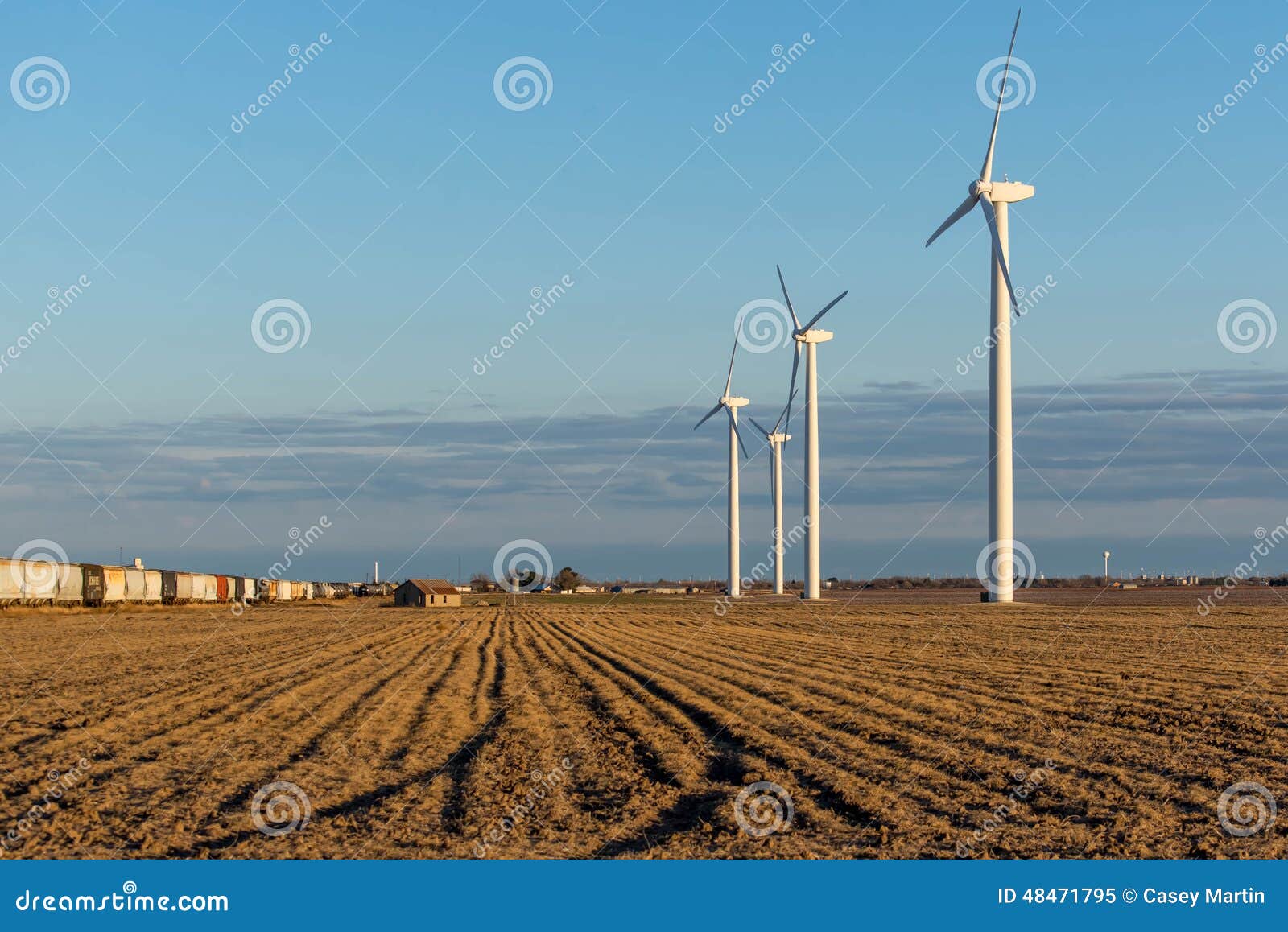 Renewable Energy - Wind Turbines in Rural Hay Fields Stock Image ...
