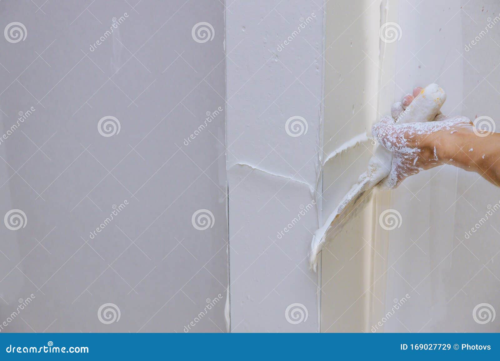 Renovation the Wall with Putty Plasterer Spreading Plaster on Wall ...