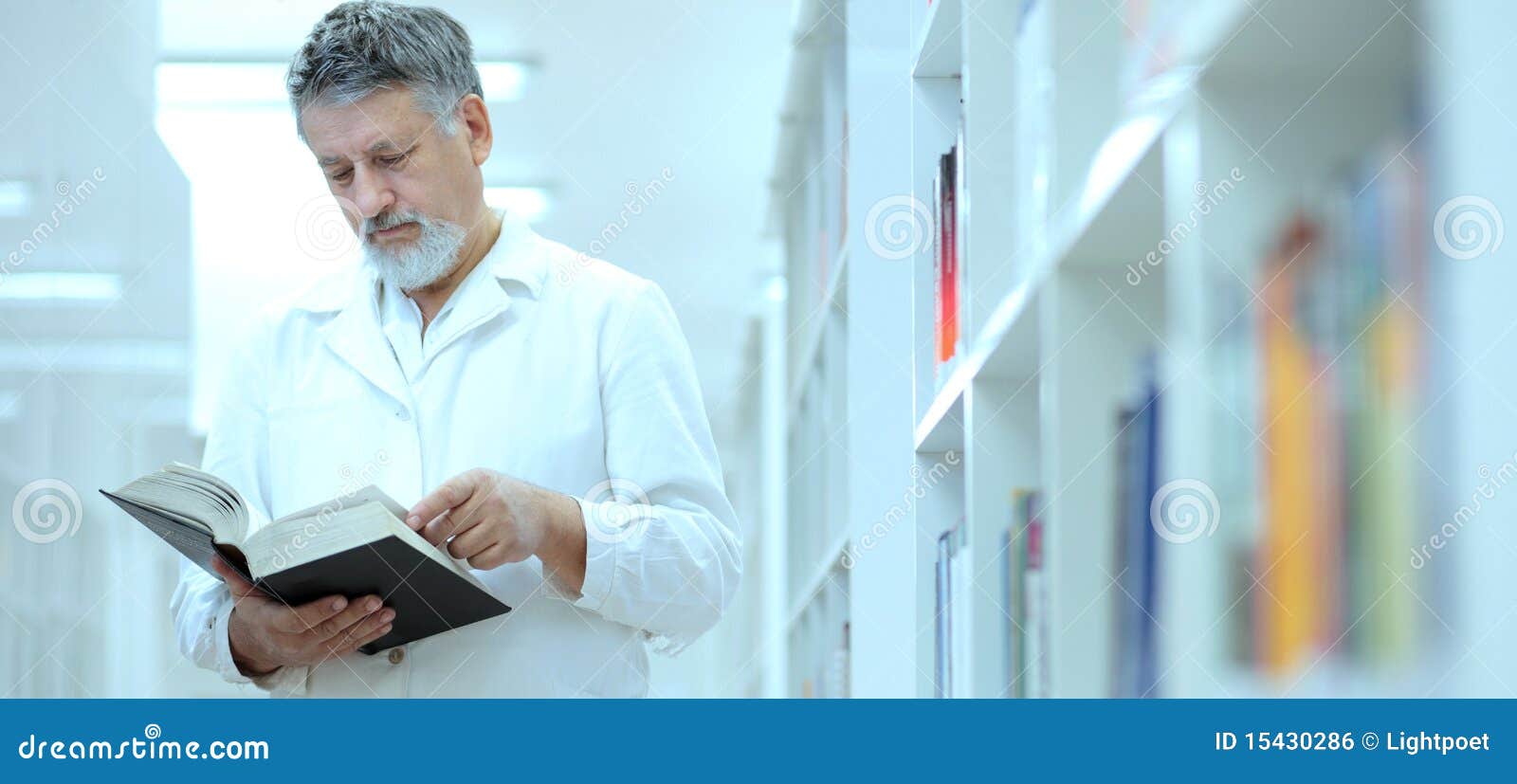 Renowned Scientist/doctor in a Library Stock Photo - Image of books ...