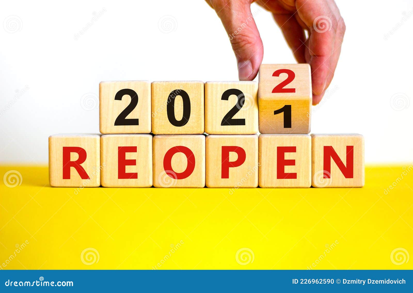 2022 Reopen New Year Symbol Businessman Turns A Wooden Cube And