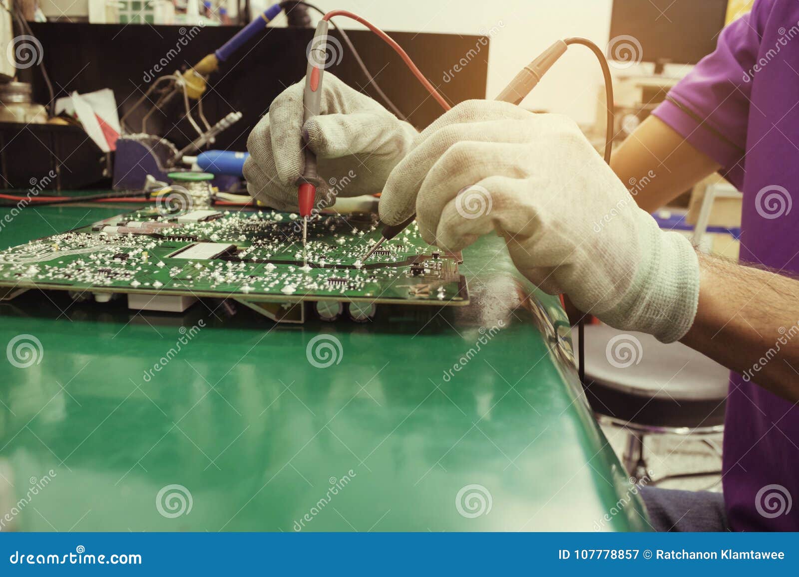 The Repair Man Using Digital Multimeter Measurement on Circuit of PCB ...