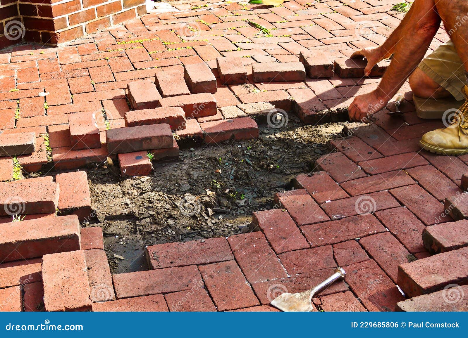 Repair of Old Red Brick Sidewalk. Stock Photo - Image of urban, soil ...