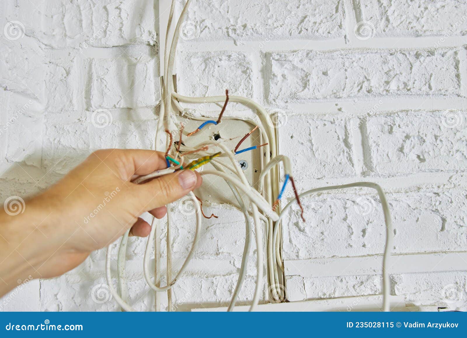 Repair and Replacement of Electrical Cables in the House Stock Image ...