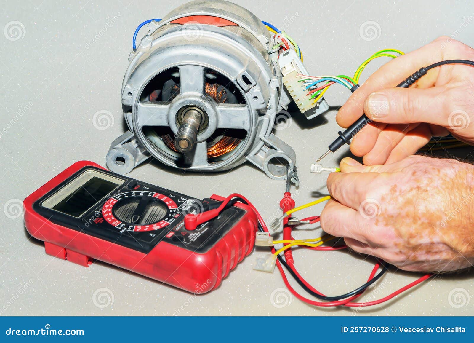 The Process of Checking the Motor Wires for a Break Stock Photo - Image ...