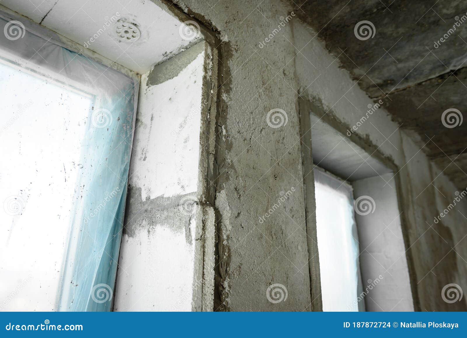Repair in the Slopes of the Window. the Process of Applying a Layer of ...