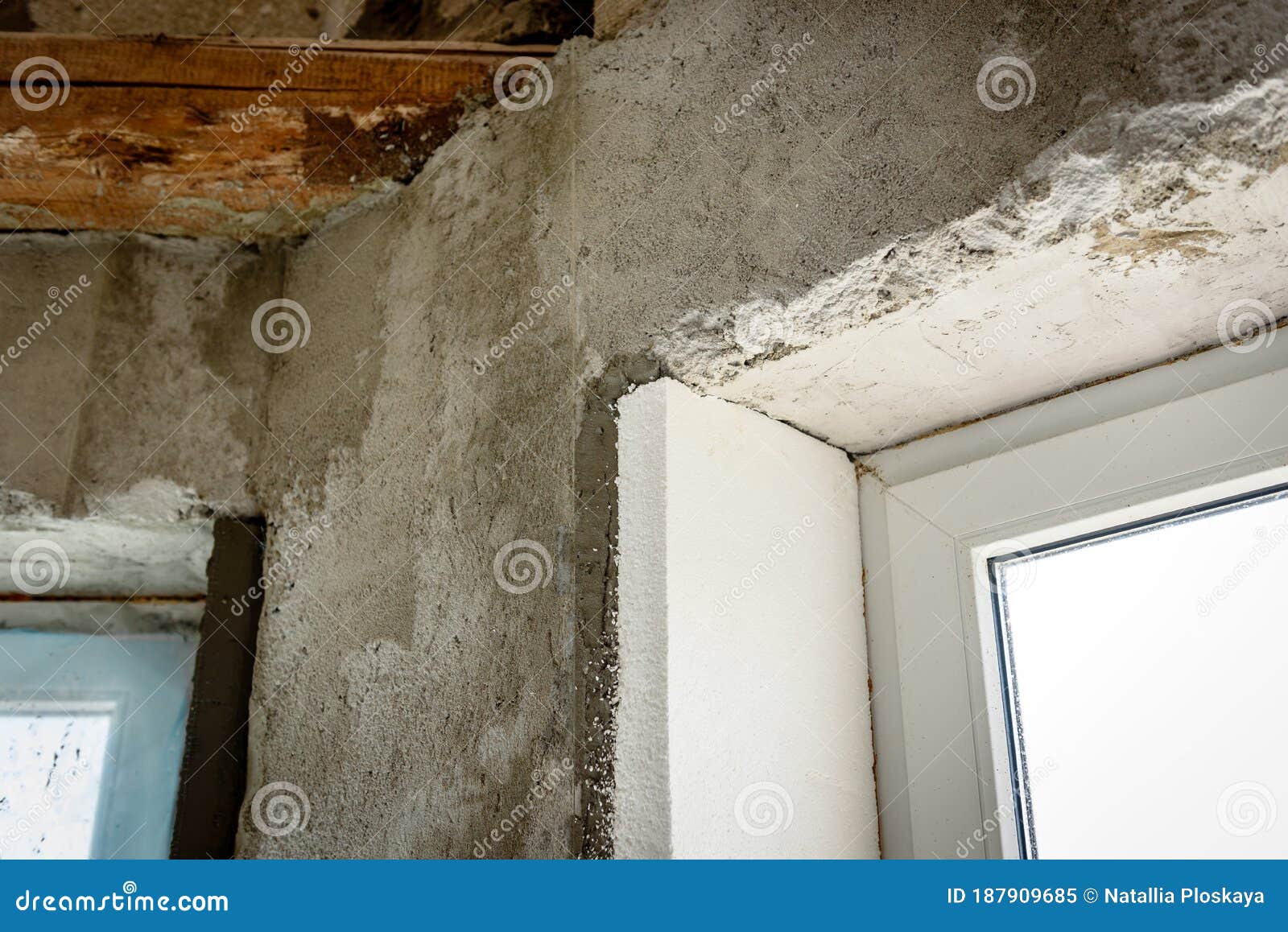 Repair in the Slopes of the Window. the Process of Applying a Layer of ...