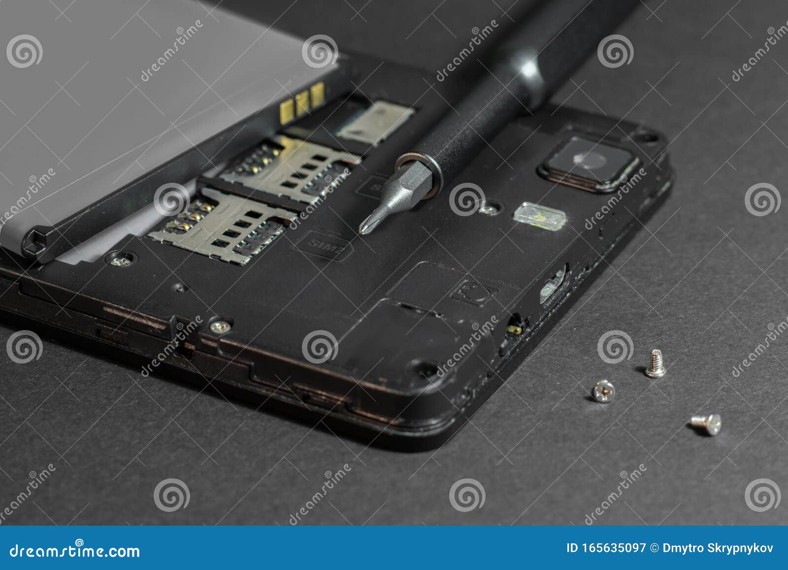 Repair Smartphone, Disassembled Phone with a Screwdriver Stock Image ...