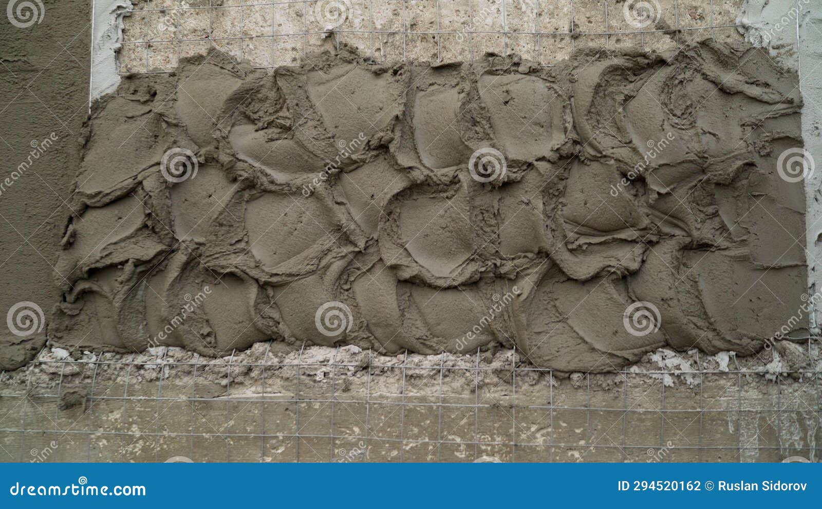 Repair of Walls Using Cement Composition. Putty with Moldings on the ...