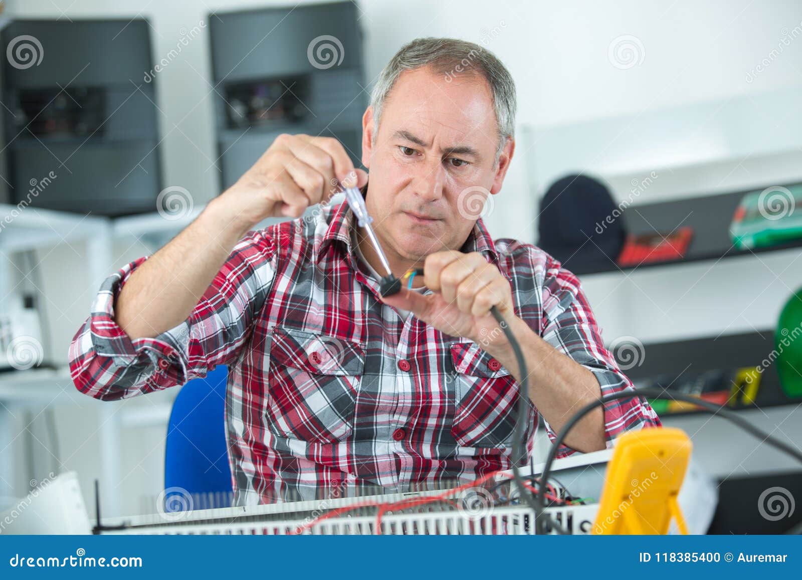 Repairer Hands with Screwdriver Disassembling Damaged Unit for Repair ...