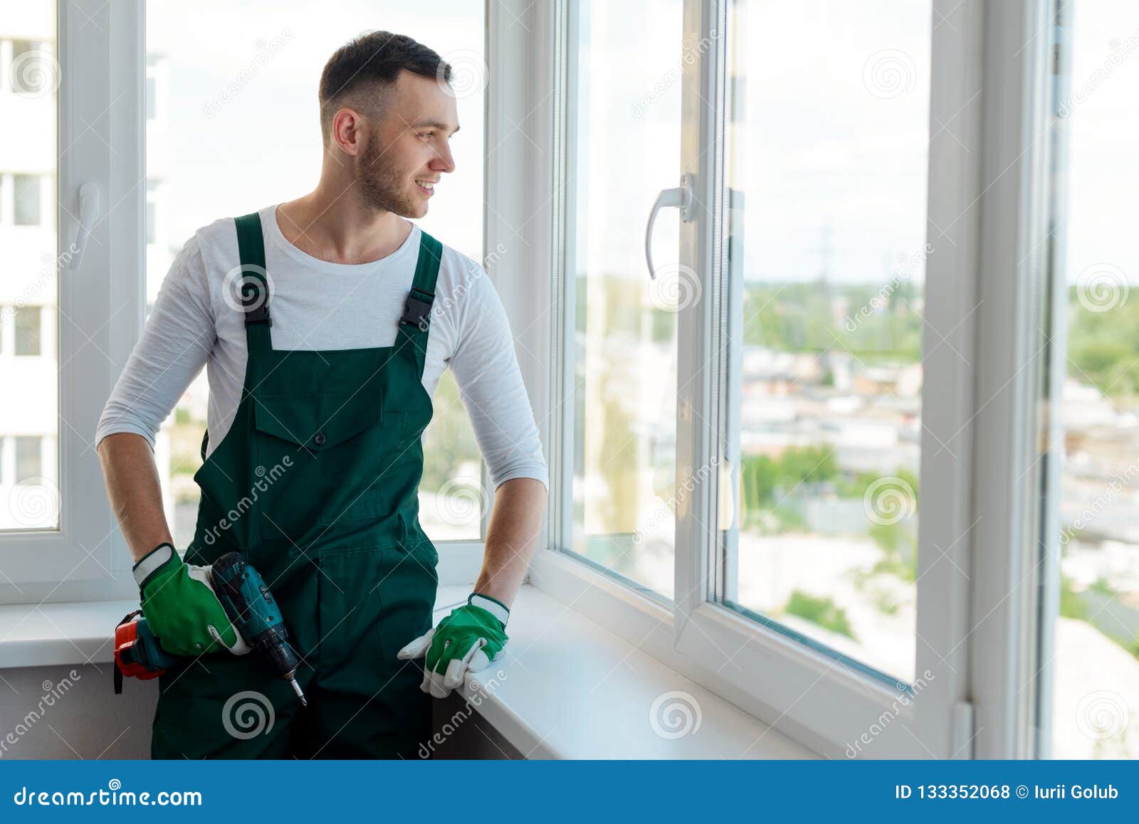 Repairer Looking at the Window Stock Photo - Image of installation ...