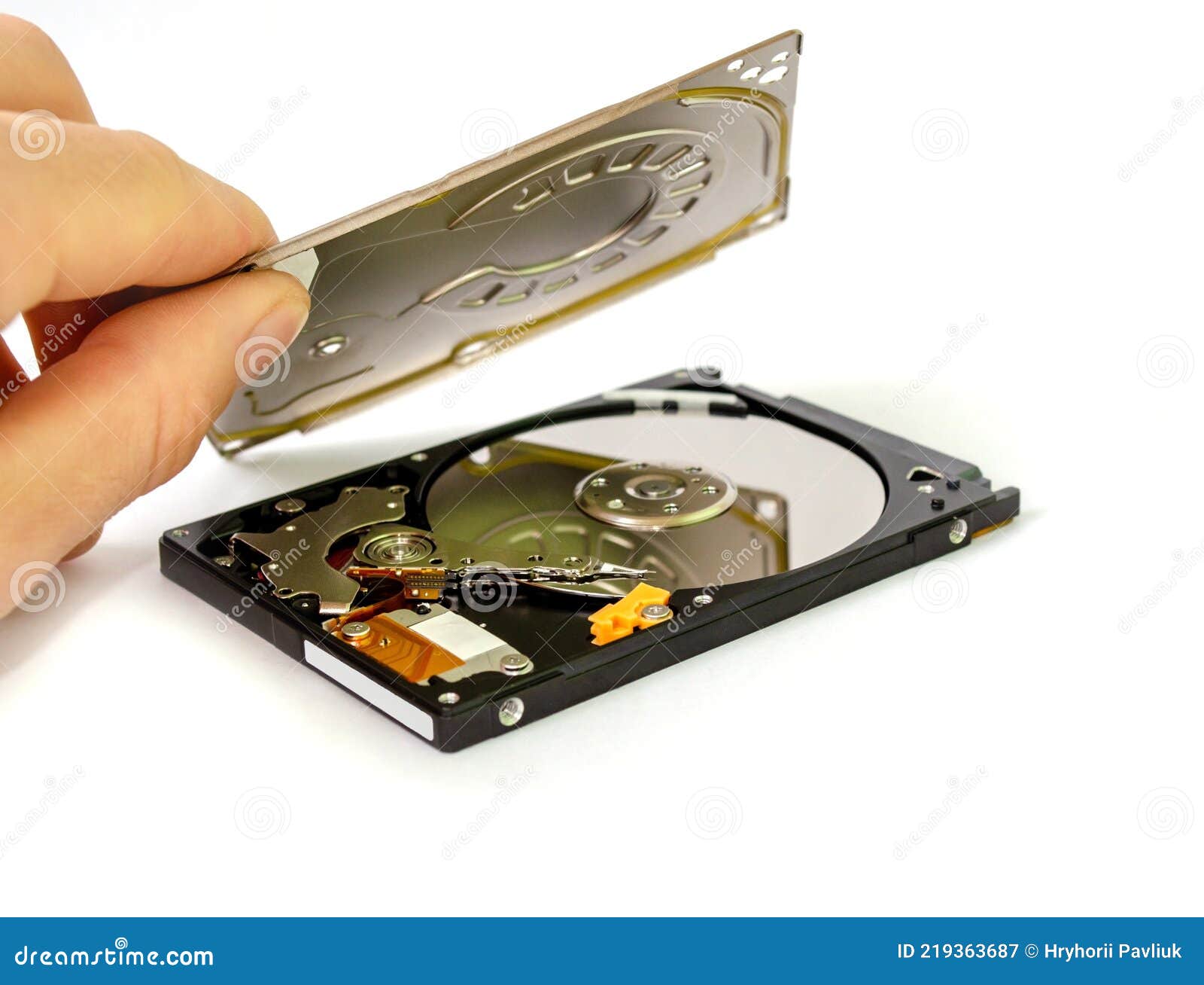 The Repairer Opens the Top Cover of the Hard Drive with His Hand HDD ...