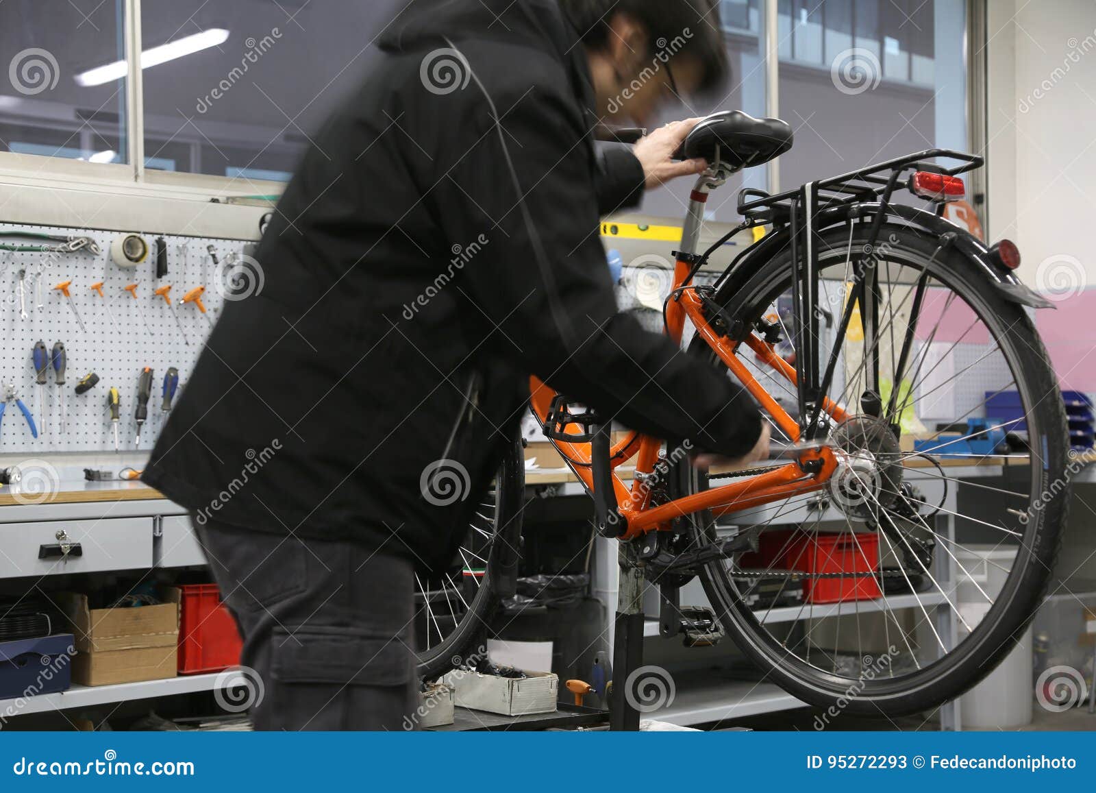 Repairing Bicycle Inside the Mechanical Workshop Specializing in Stock ...
