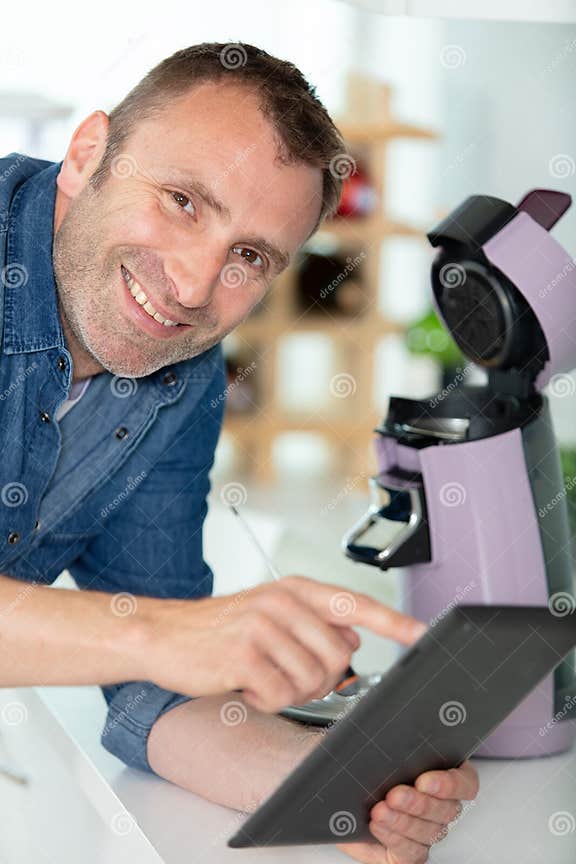 Repairing Broken Coffee Machine Stock Photo - Image of master, device ...