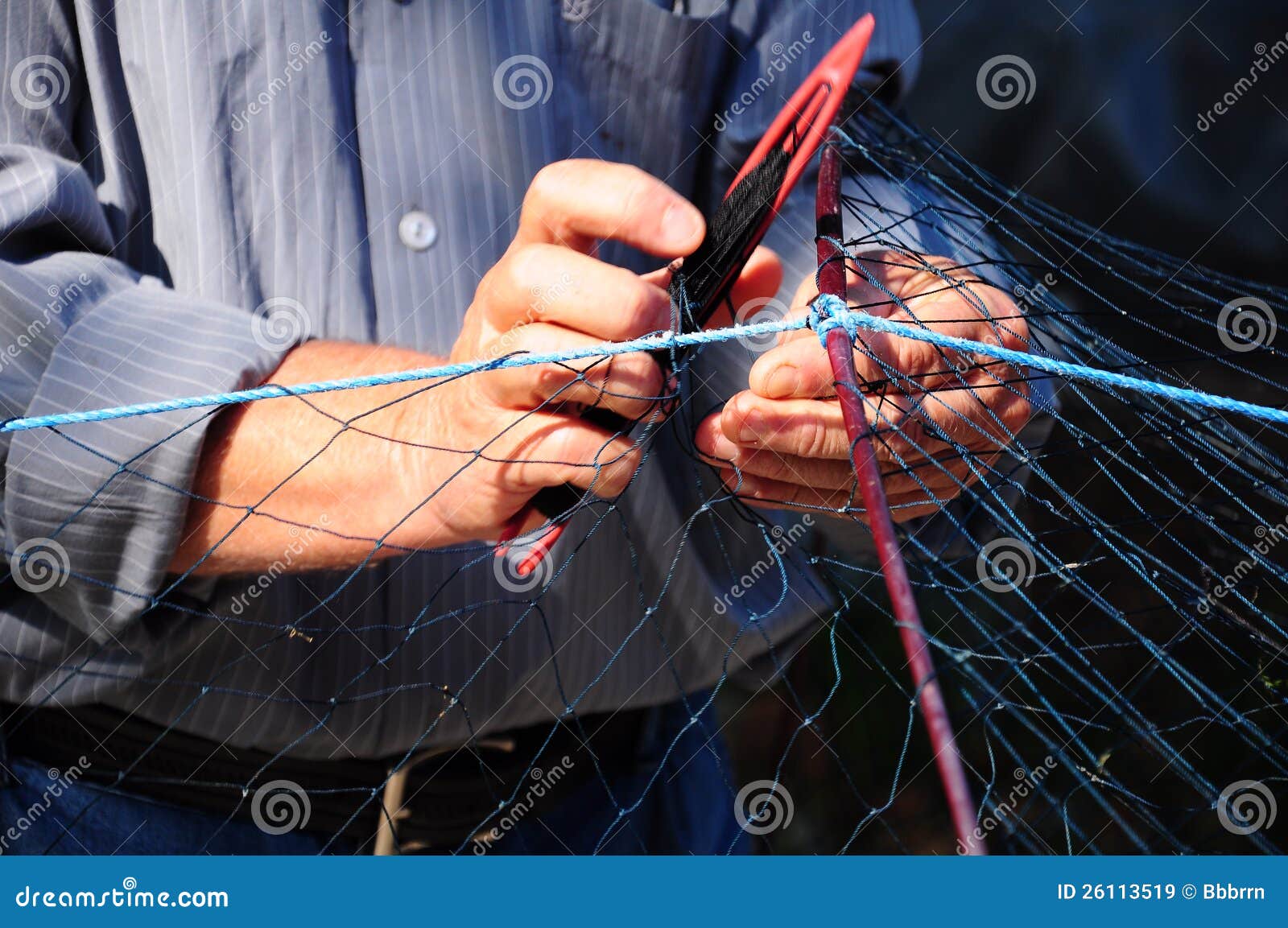 Repairing a fishing net stock image. Image of knot, catch - 26113519