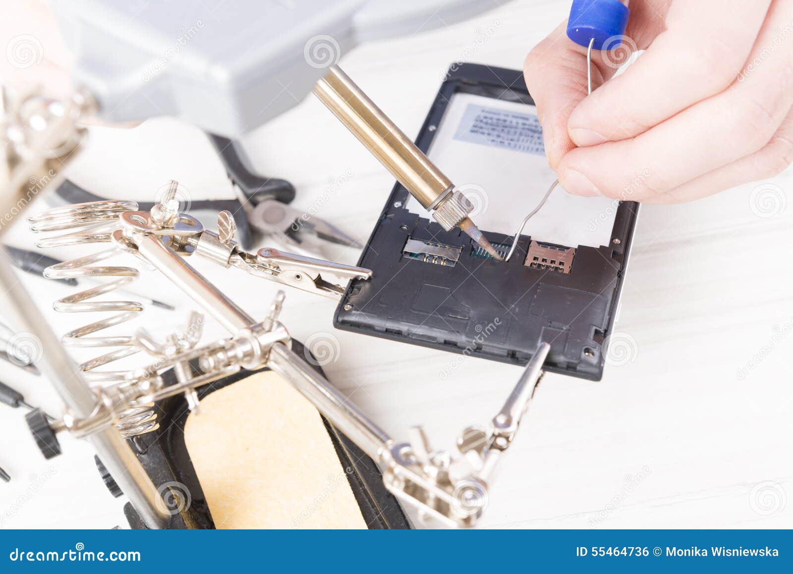 Repairing Mobile Phone in the Electronic Workshop Stock Photo - Image ...
