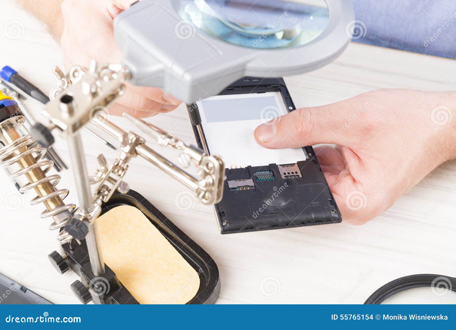 Repairing Mobile Phone in the Electronic Workshop Stock Photo - Image ...