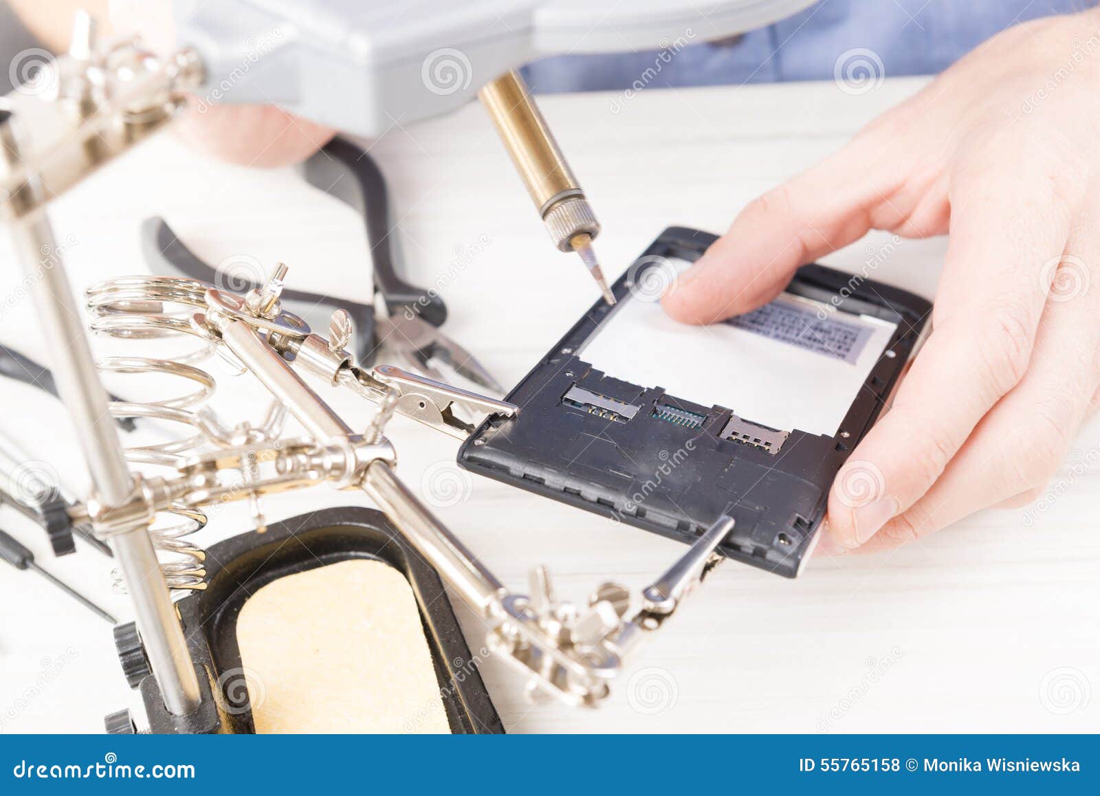 Repairing Mobile Phone in the Electronic Workshop Stock Photo - Image ...