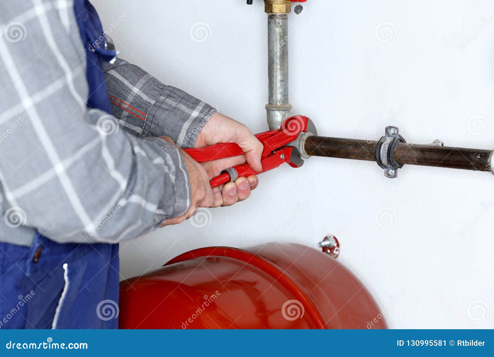 Repairing a pipe stock image. Image of engineer, looking - 130995581