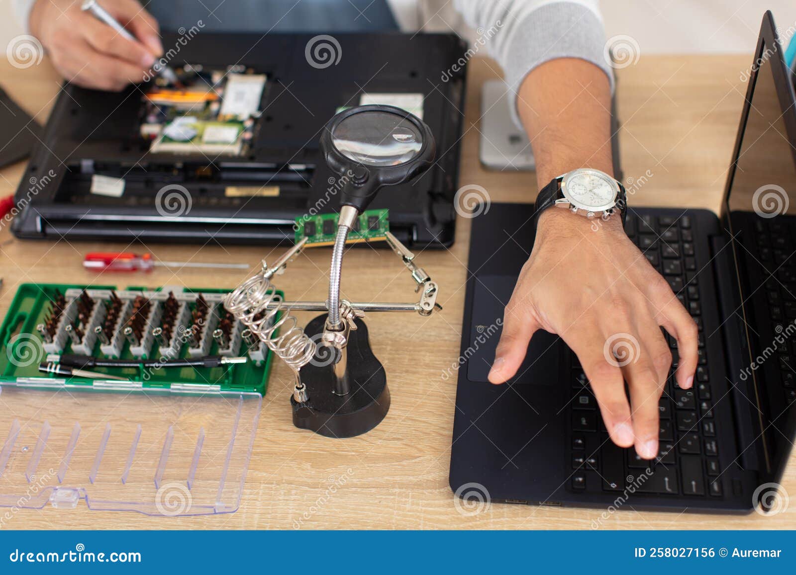 Repairman Disassembling Laptop Motherboard Stock Photo - Image of ... Repairman Disassembling Laptop Motherboard Stock Photo - Image of ...