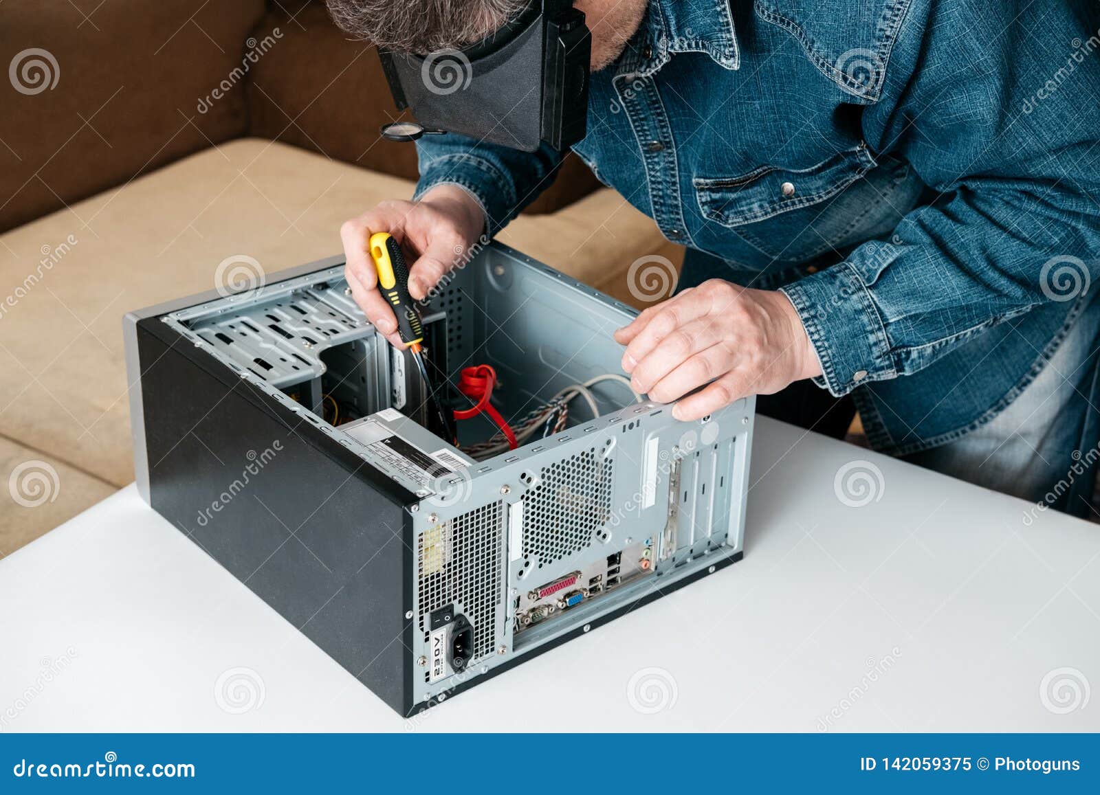 Repairman is Disassembling Personal Computer. Engineer is Diagnostic ...