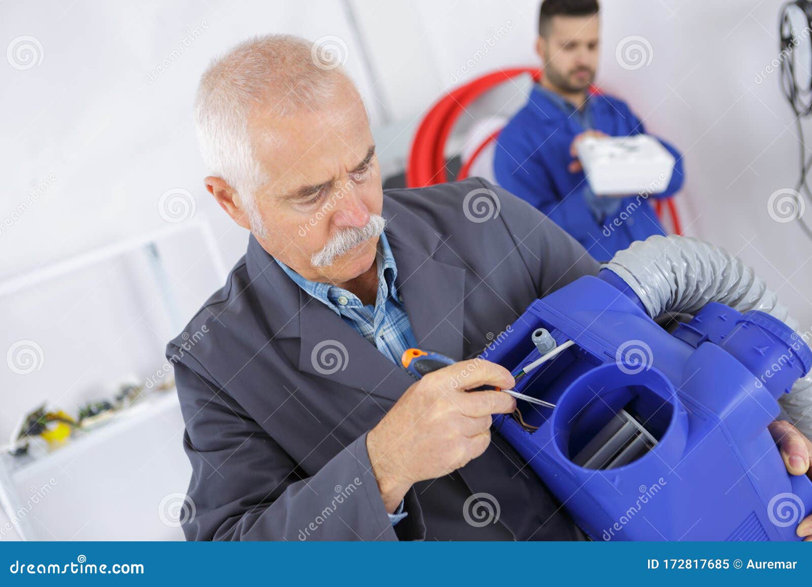 Repairman engineer at work stock image. Image of controlling - 172817685